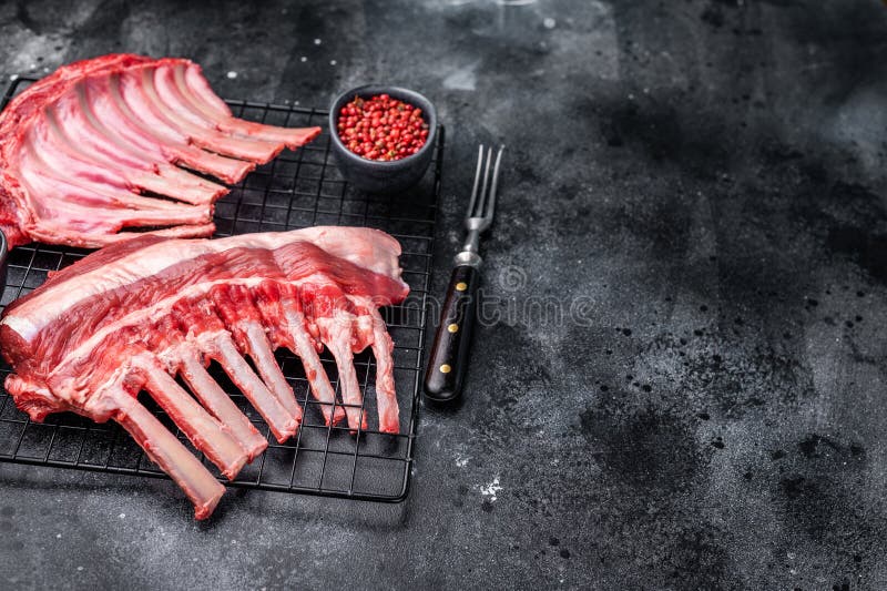 Raw Rack of Lamb, Fresh Mutton Meat for Chops Cutlets. Black Background ...