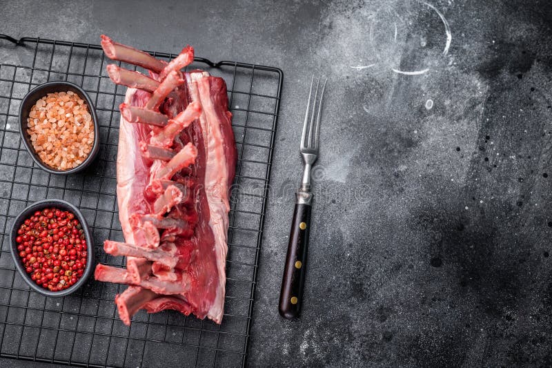 Raw Rack of Lamb, Fresh Mutton Meat for Chops Cutlets. Black Background ...