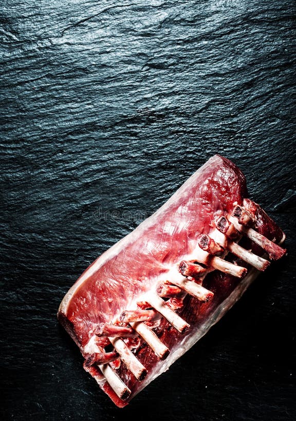 Raw Rectangle of Lamb Chops on Textured Surface Stock Photo - Image of ...