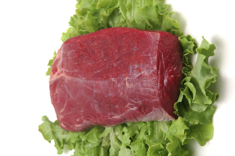 Raw red beef meat on salad stock photo. Image of tasty - 9752852