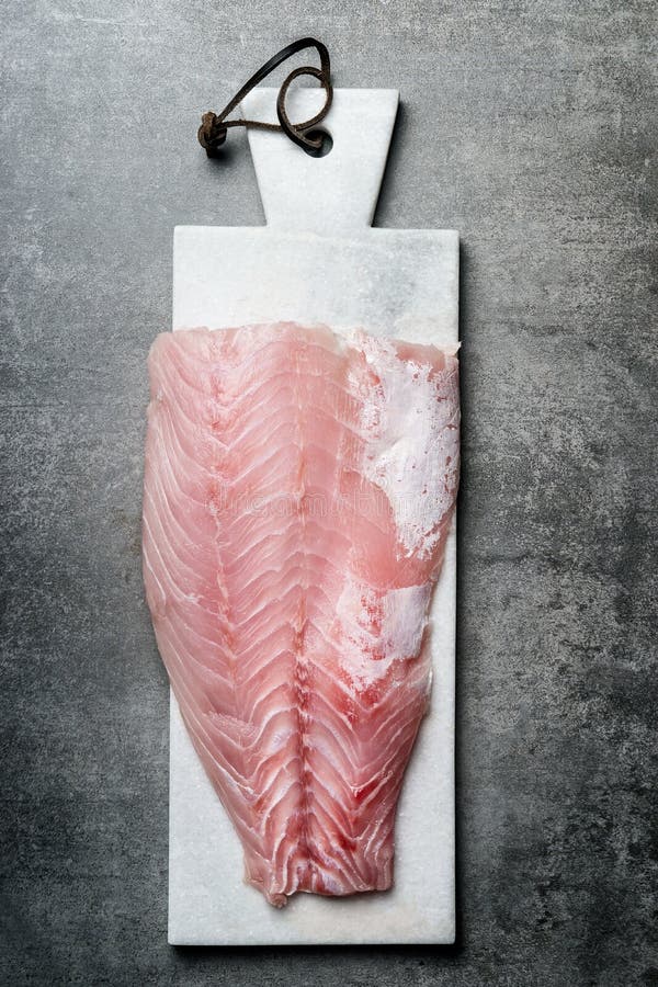 Raw Red Fish Fillets on Marble Cutting Board Stock Photo - Image of ...