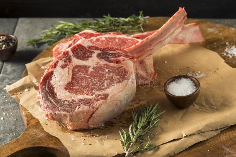 Raw Red Grass Fed Tomahawk Steaks Stock Image - Image of angus, bone ...