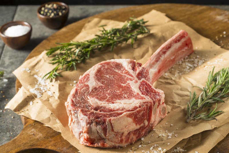 Raw Red Grass Fed Tomahawk Steaks Stock Image - Image of grill, ribeye ...