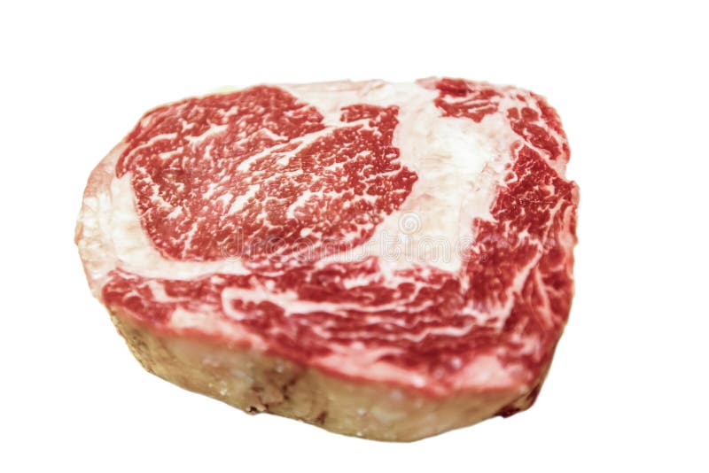 Raw Ribeye Beef Lies on a White Background. Marbled Meat. Stock Image ...