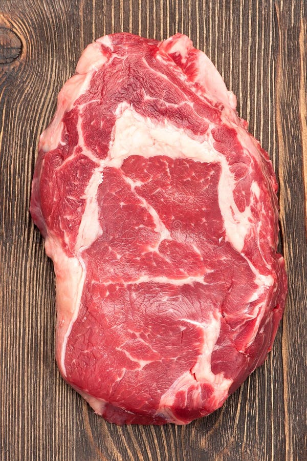 Raw Ribeye Steak Close-up, Top View Stock Image - Image of spice, black ...