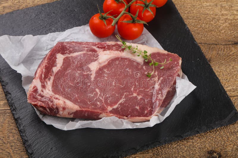 Raw ribeye steak stock photo. Image of meat, pepper - 111785494