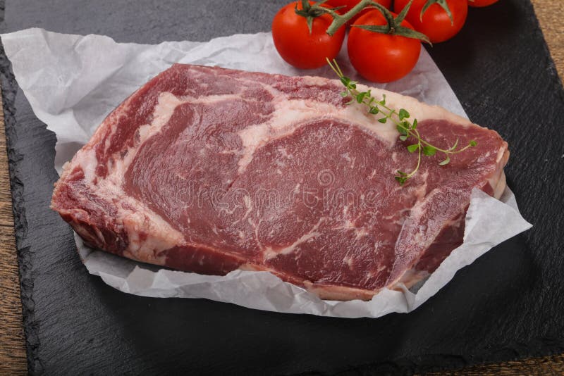 Raw ribeye steak stock image. Image of angus, cooking - 111964031