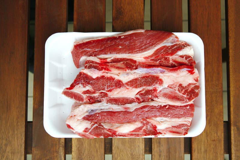 Raw ribs on wood stock photo. Image of marbled, lunch - 14944858