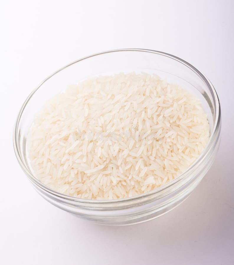 Raw rice in a bowl stock image. Image of photograph, chinese - 22708657