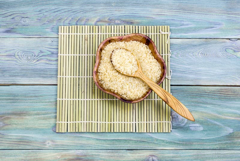 Raw rice in a bowl stock image. Image of heap, agriculture - 95332845