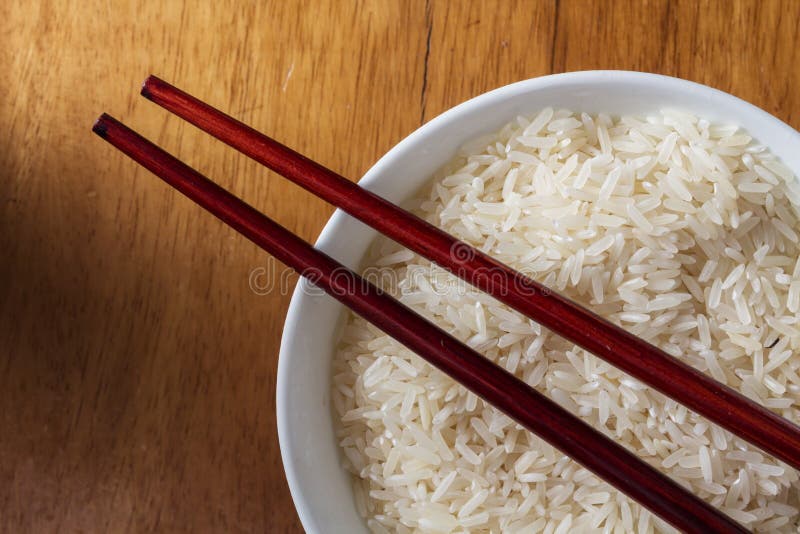 Raw rice in bowl. stock image. Image of brown, objects - 37282649