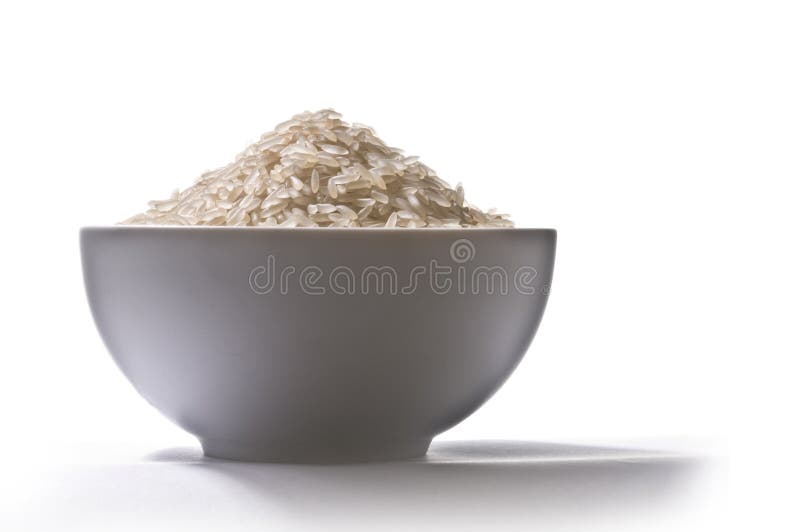 Raw Rice Grains in a Cup, Lateral View Stock Image - Image of ...
