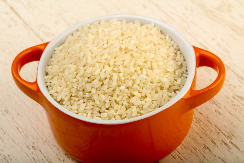Raw rice heap stock image. Image of natural, ingredient - 111507643