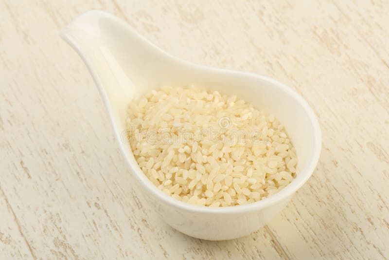 Raw rice heap stock photo. Image of crop, traditional - 111619970