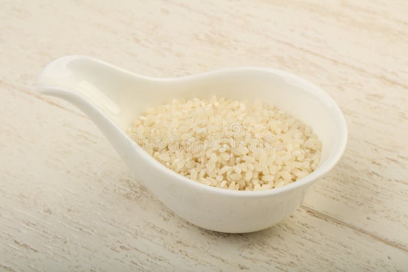 Raw rice heap stock image. Image of ingredient, crop - 111924543