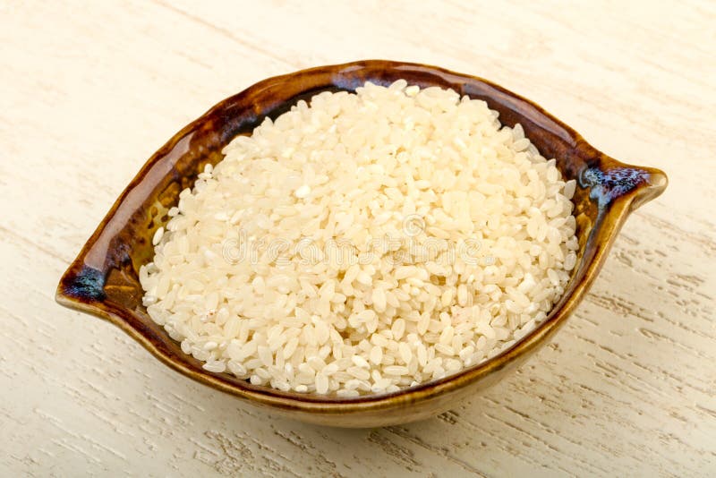 Raw rice heap stock photo. Image of healthy, ingredient - 112412960