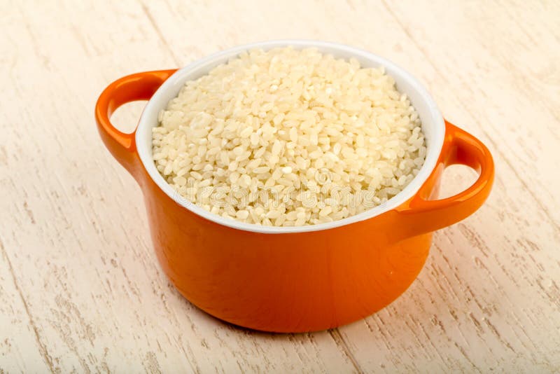 Raw rice heap stock image. Image of grain, heap, natural - 114722511