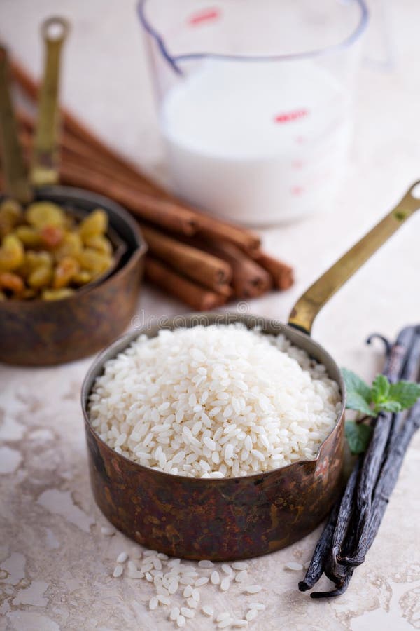 Raw Rice in a Measuring Cup Ready To Be Cooked Stock Photo - Image of ...