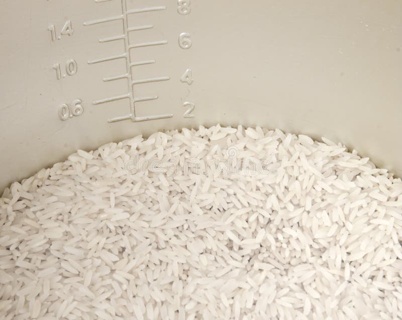 Raw rice ready for cooking stock image. Image of home - 20360207