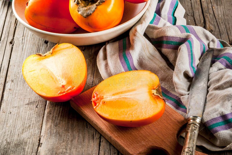 Raw ripe persimmon stock photo. Image of nature, persimmon - 107060968