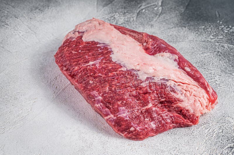 Raw Round Beef Meat Cut on a Butcher Table. White Background Stock ...