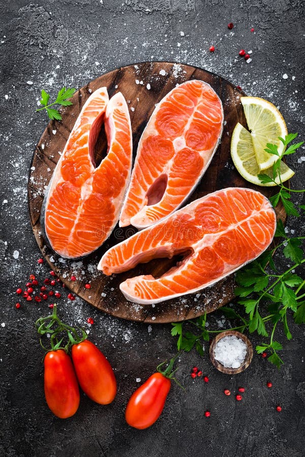 Raw Salmon Fish. Fresh Salmon Steaks Stock Photo - Image of black ...