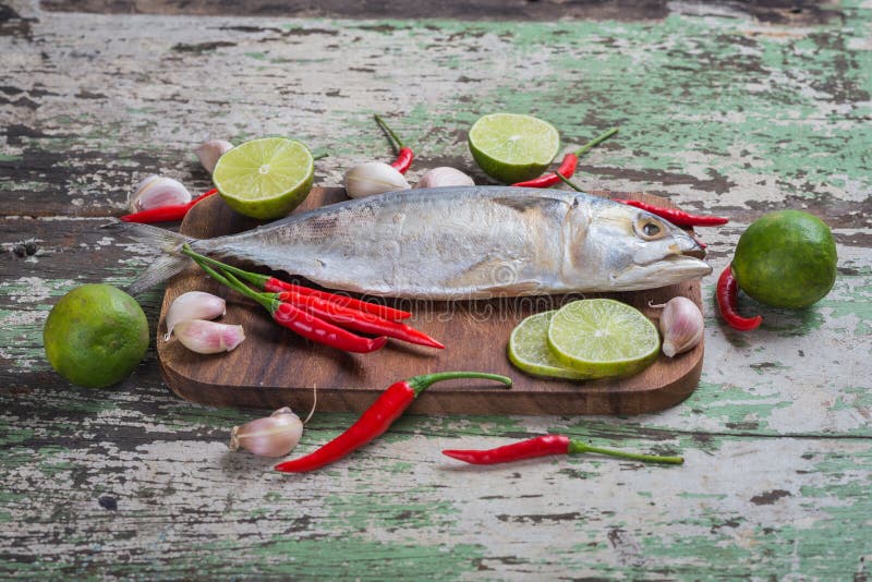 Raw Salt Mackerel Fish with Vegetables Stock Photo - Image of fresh ...