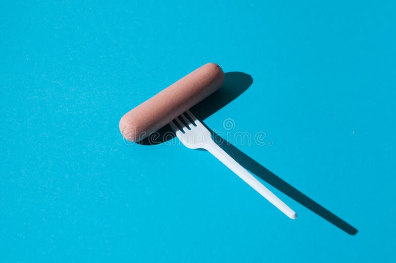 Raw Sausage Blue Background Plastic Fork Stock Photos - Free & Royalty ...