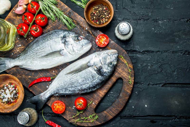 Raw Sea Fish Dorado with Spices and Rosemary Stock Image - Image of ... Raw Sea Fish Dorado with Spices and Rosemary Stock Image - Image of ...