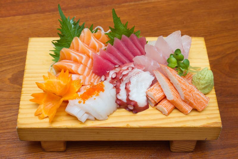 Raw Seafood Sashimi stock photo. Image of leaf, color - 12059236