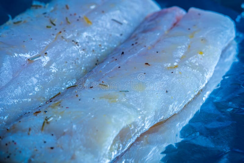 Raw Seasoned Fish Fillets on Baking Tray Closeup Stock Photo - Image of ...