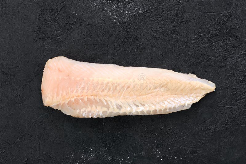 Raw Shallow-water Hake Fillet on Black Background Stock Photo - Image ...