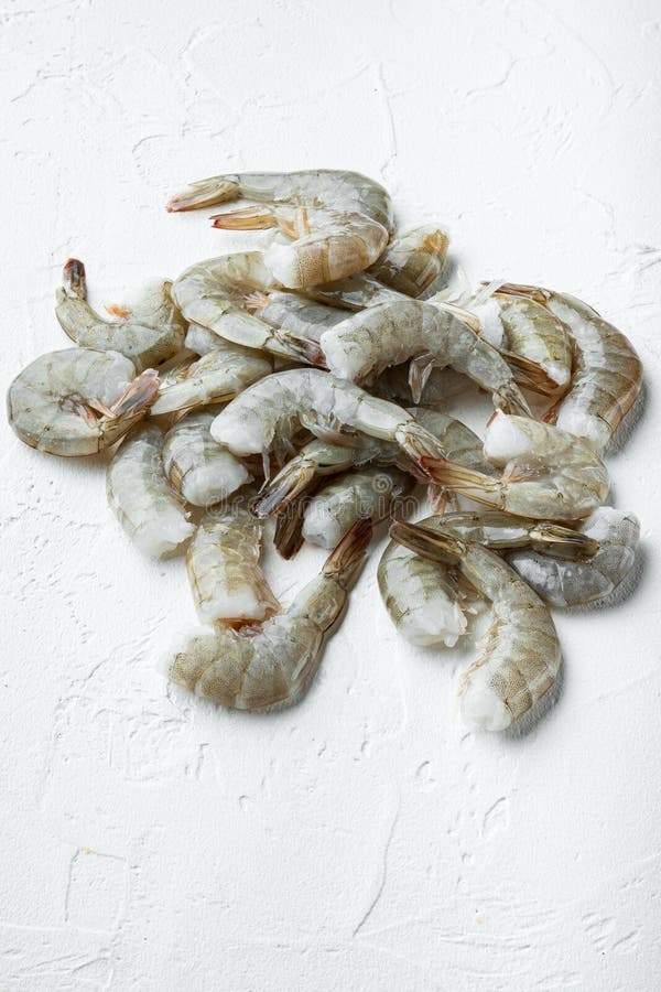 Raw Shell on King Prawns, on White Stone Surface, with Copy Space for ...