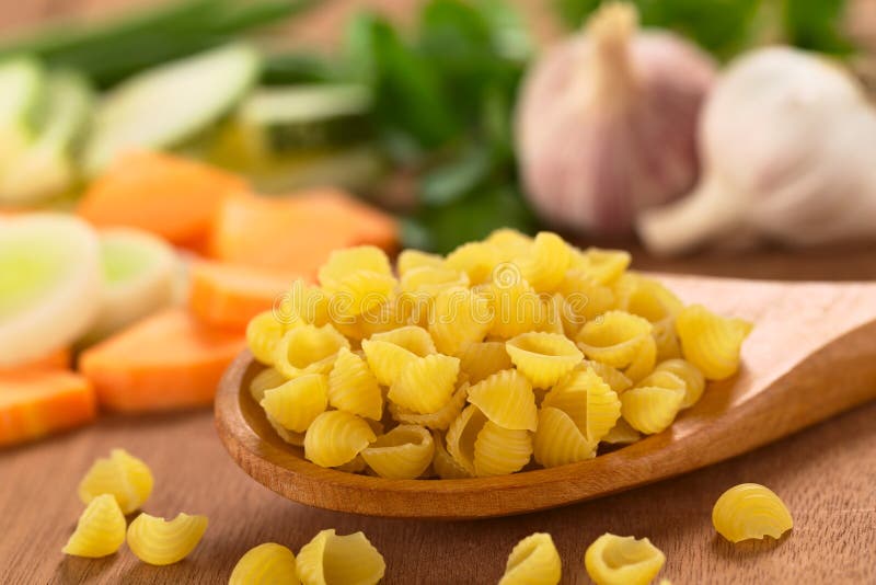 Raw Shell Pasta stock image. Image of conchiglie, wooden - 26318605