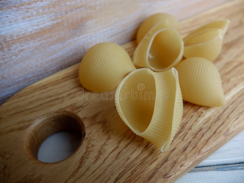 Raw Shell Pasta Close Up Wooden Board Stock Photos - Free & Royalty ...