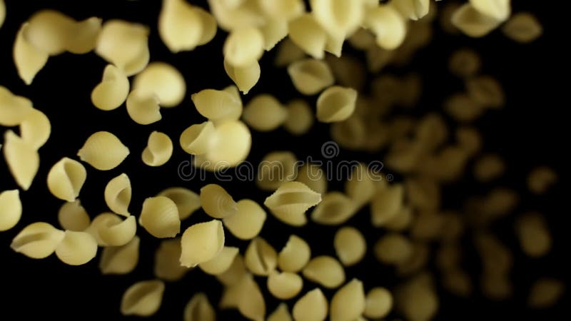 Raw Shells Pasta Flies. Pile of Italian Pasta Macaroni Bouncing Against ...