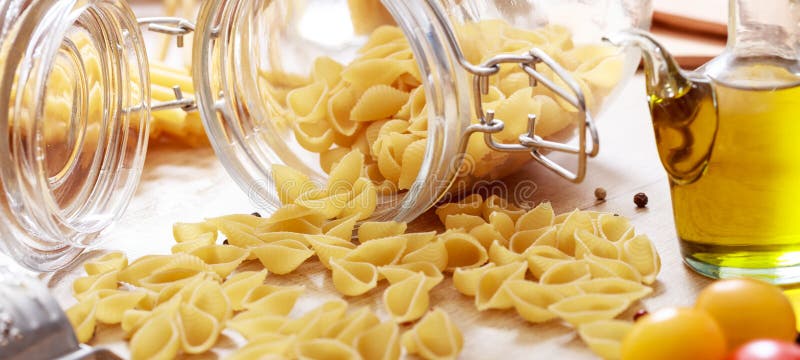 Raw Shells Pasta, Tomatoes and Olive Oil Stock Image - Image of cuisine ...