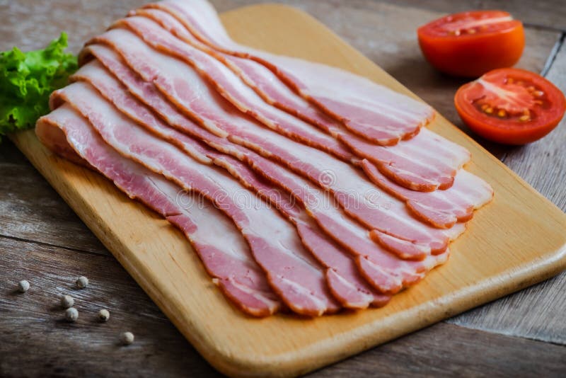 Raw Sliced Bacon on Wooden Board Stock Photo - Image of sliced ...