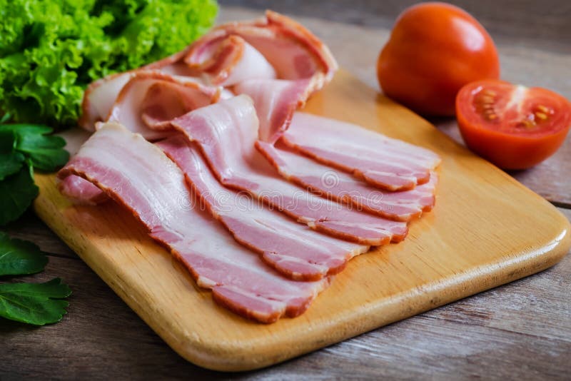 Raw Sliced Bacon on Wooden Board Stock Image - Image of gourmet ...