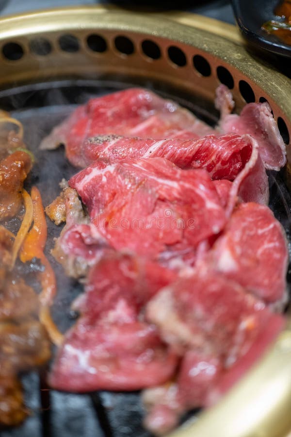Raw Sliced Beef Cooking on the Grill Stock Photo - Image of korean ...