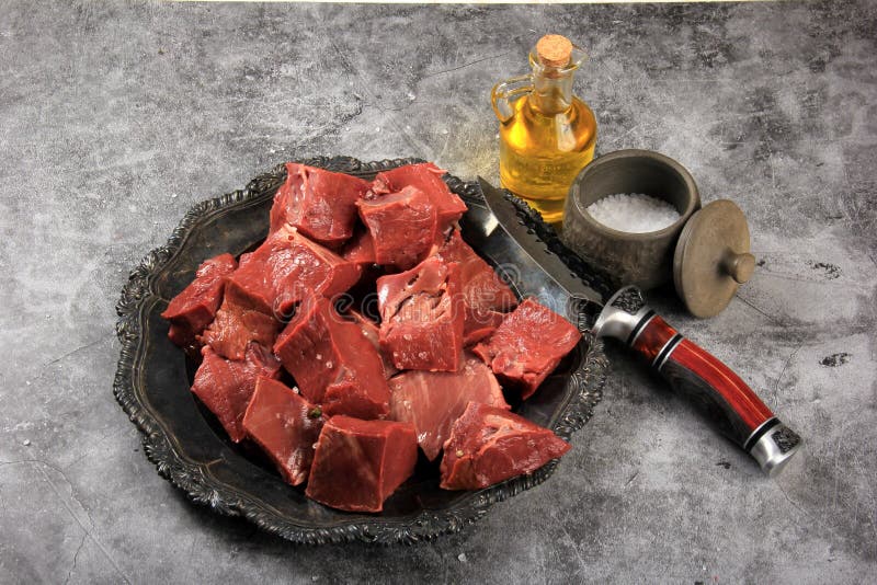 Raw Sliced Beef Heart on Black Background. Stock Image - Image of ...