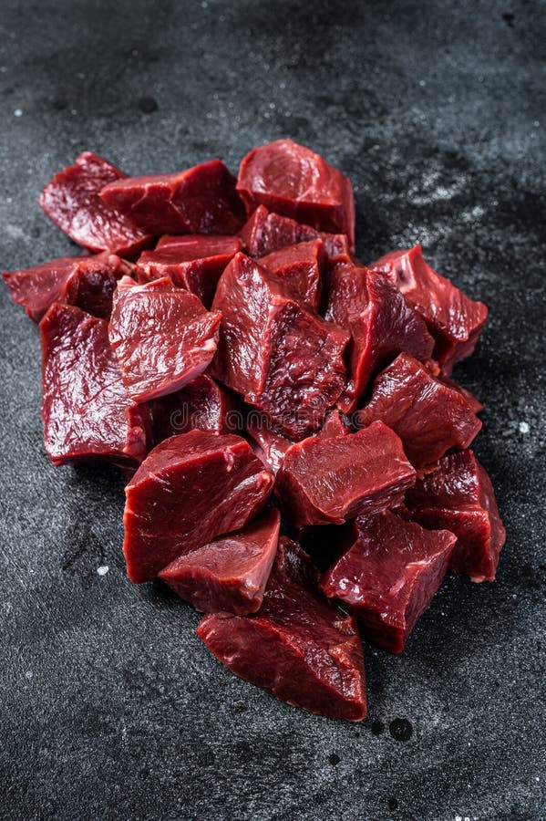 Raw Sliced Beef or Veal Heart. Black Background Stock Image - Image of ...