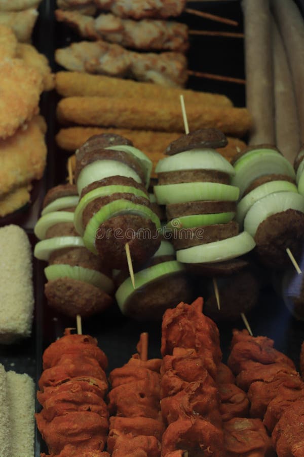 Raw snacks on display stock image. Image of croquette - 196797371