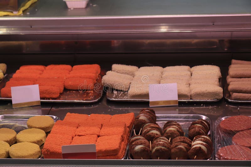 Raw snacks on display stock photo. Image of merchandise - 196797336