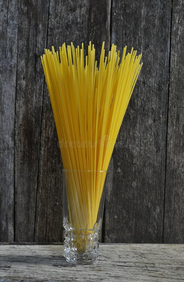 Raw spaghetti stack stock image. Image of nutrition, cooking - 46271651