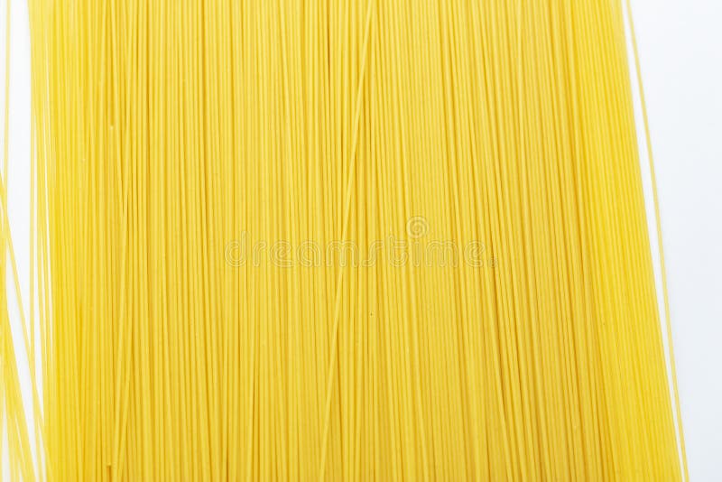 Raw Spaghetti on White Background. Yellow Italian Pasta Stock Photo ...