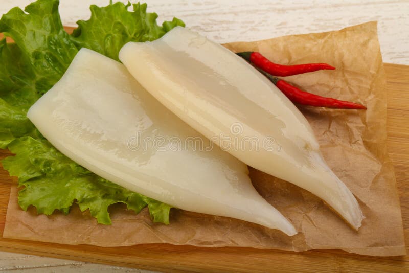 Raw squid fillet stock photo. Image of tentacles, cooking - 111784044