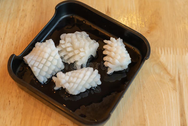 Raw squid in tray stock image. Image of closeup, sale - 130767621