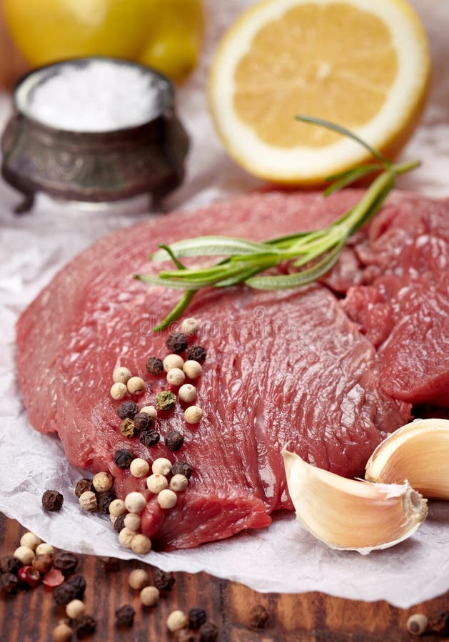 Raw steak stock photo. Image of beef, bloody, meat, peppercorns - 25161706