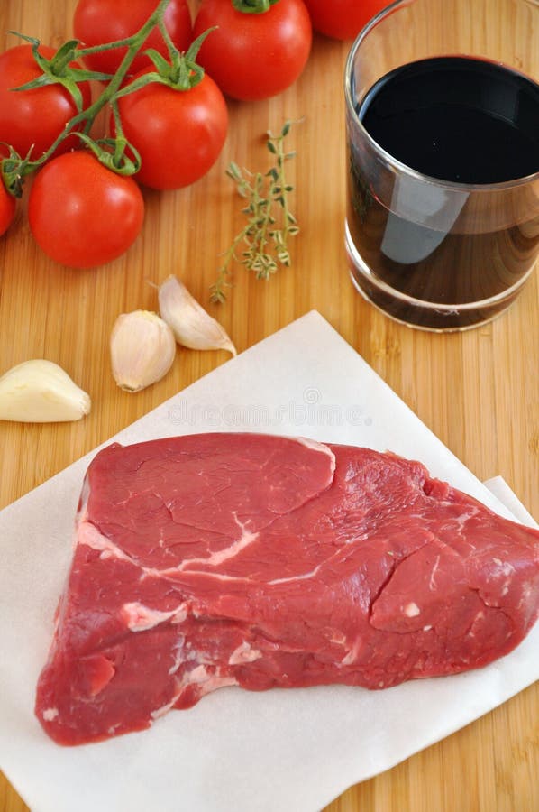 Raw steak stock photo. Image of board, blood, beefsteak - 29152424